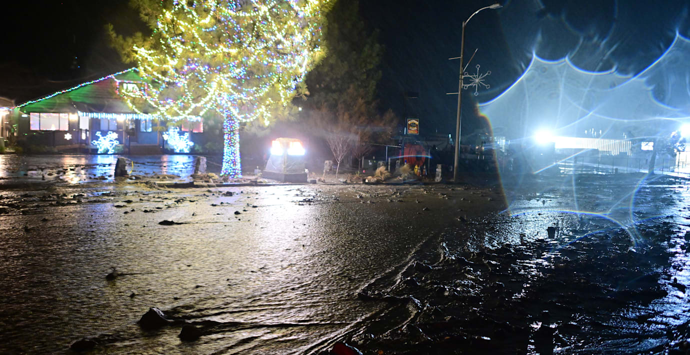 Kvinna räddad – efter att ha svepts med 14 kilometer